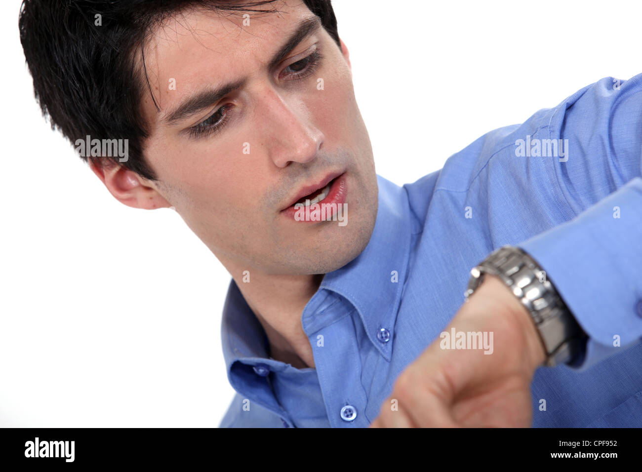 Man looking at the time Stock Photo - Alamy