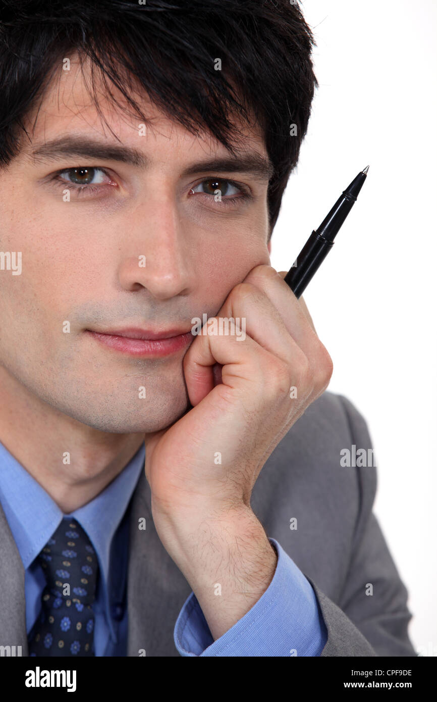Pensive businessman reading documents work hi-res stock photography and ...