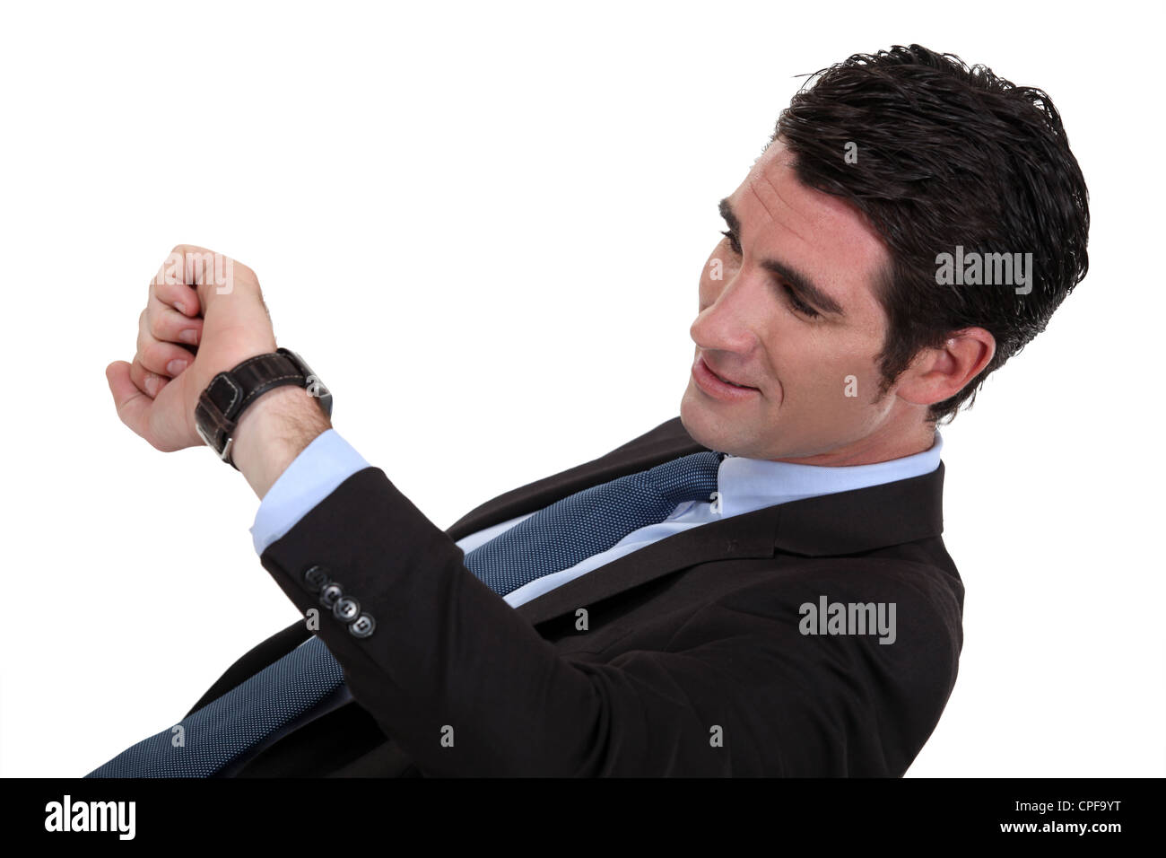 Man looking at the time Stock Photo - Alamy