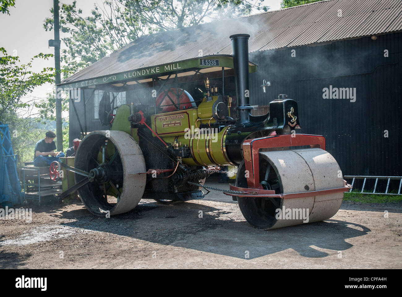 Steam engine waits while driver takes a break Stock Photo - Alamy