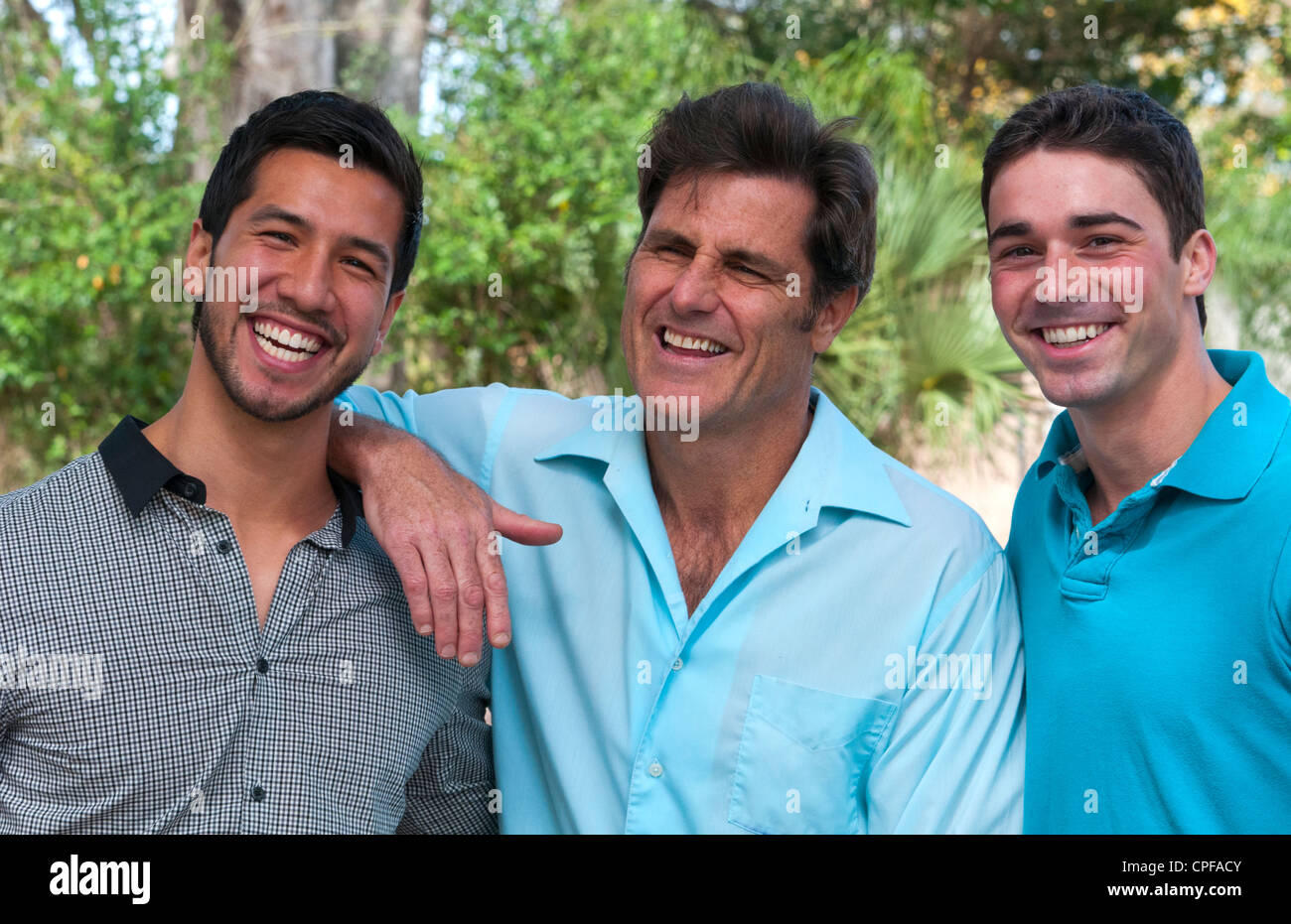 Male buddies friends in park portrait aged 30s and 40s in sunshine ...
