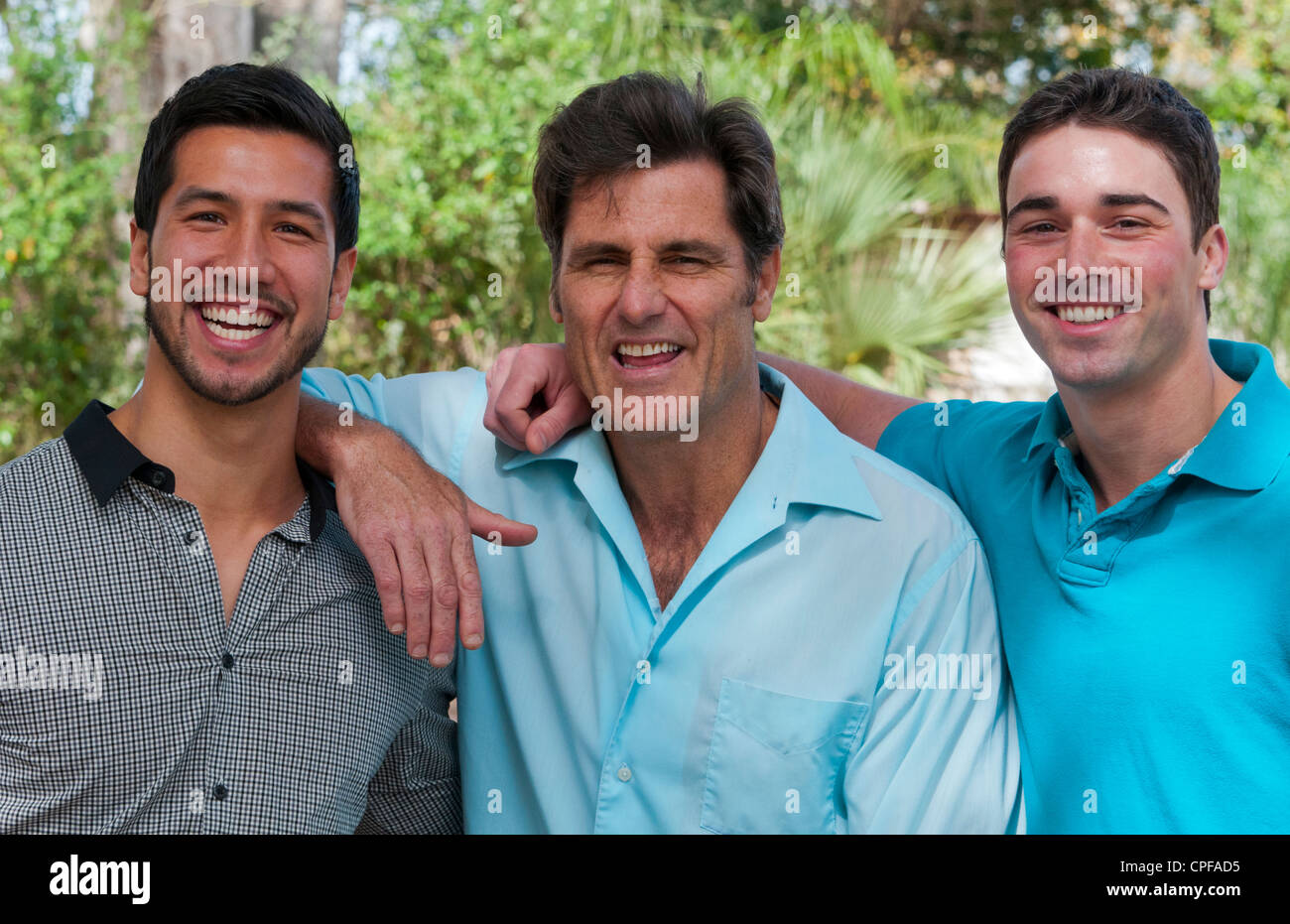 Male buddies friends in park portrait aged 30s and 40s in sunshine ...