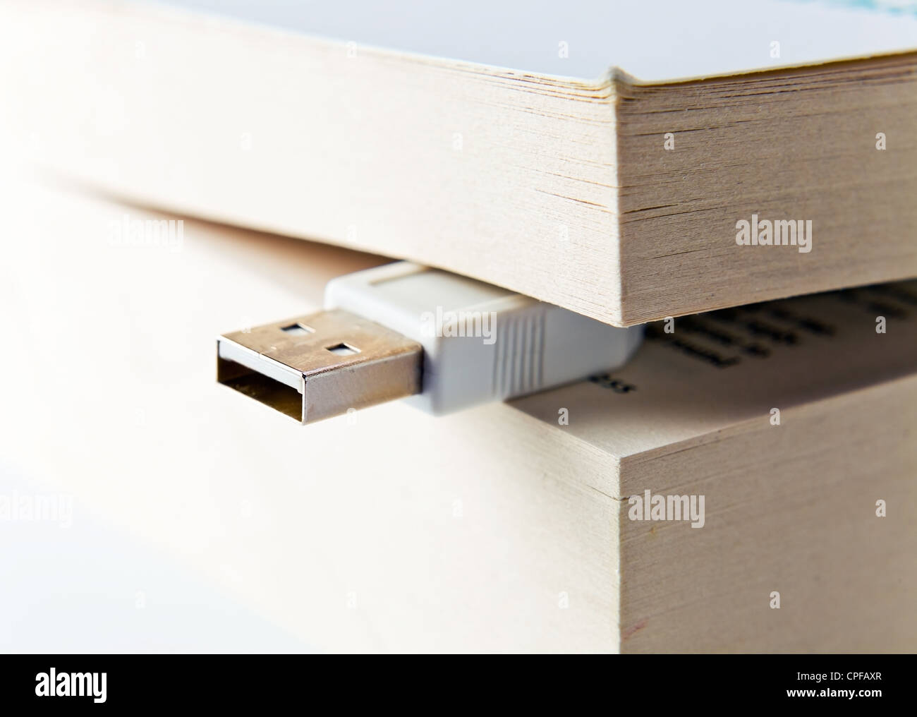Book with USB plug . Macro shot , focus on a center Stock Photo - Alamy
