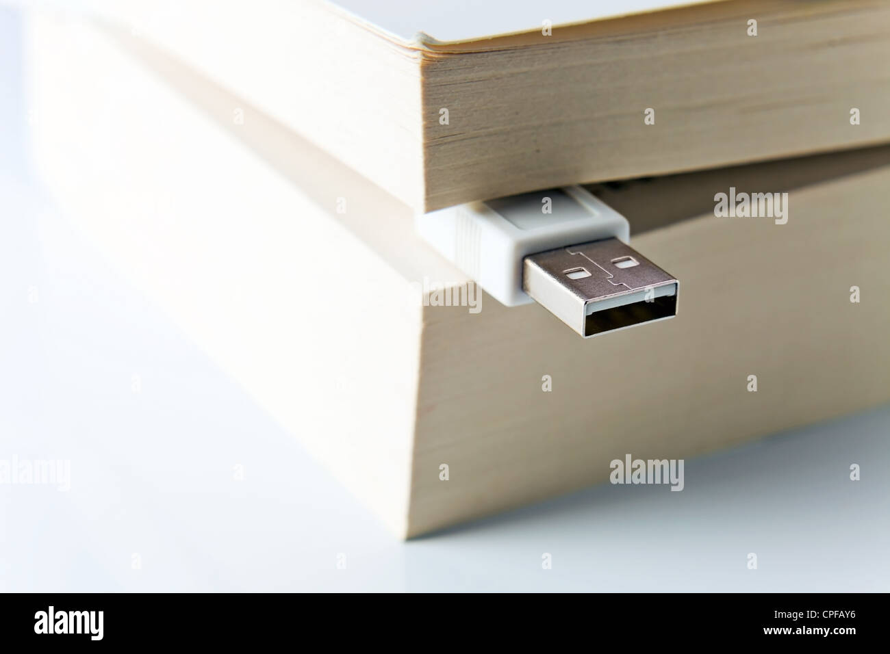 Book with USB plug . Macro shot Stock Photo - Alamy