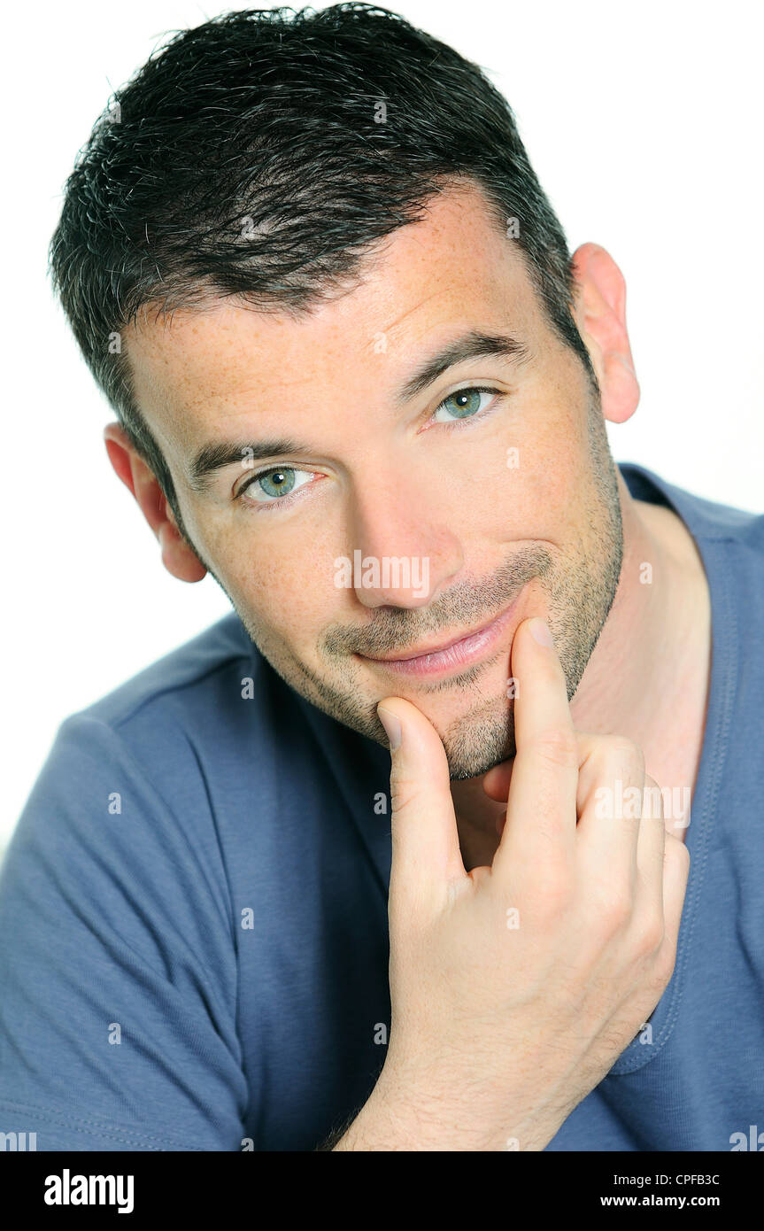 natural and relaxed looking young man Stock Photo - Alamy