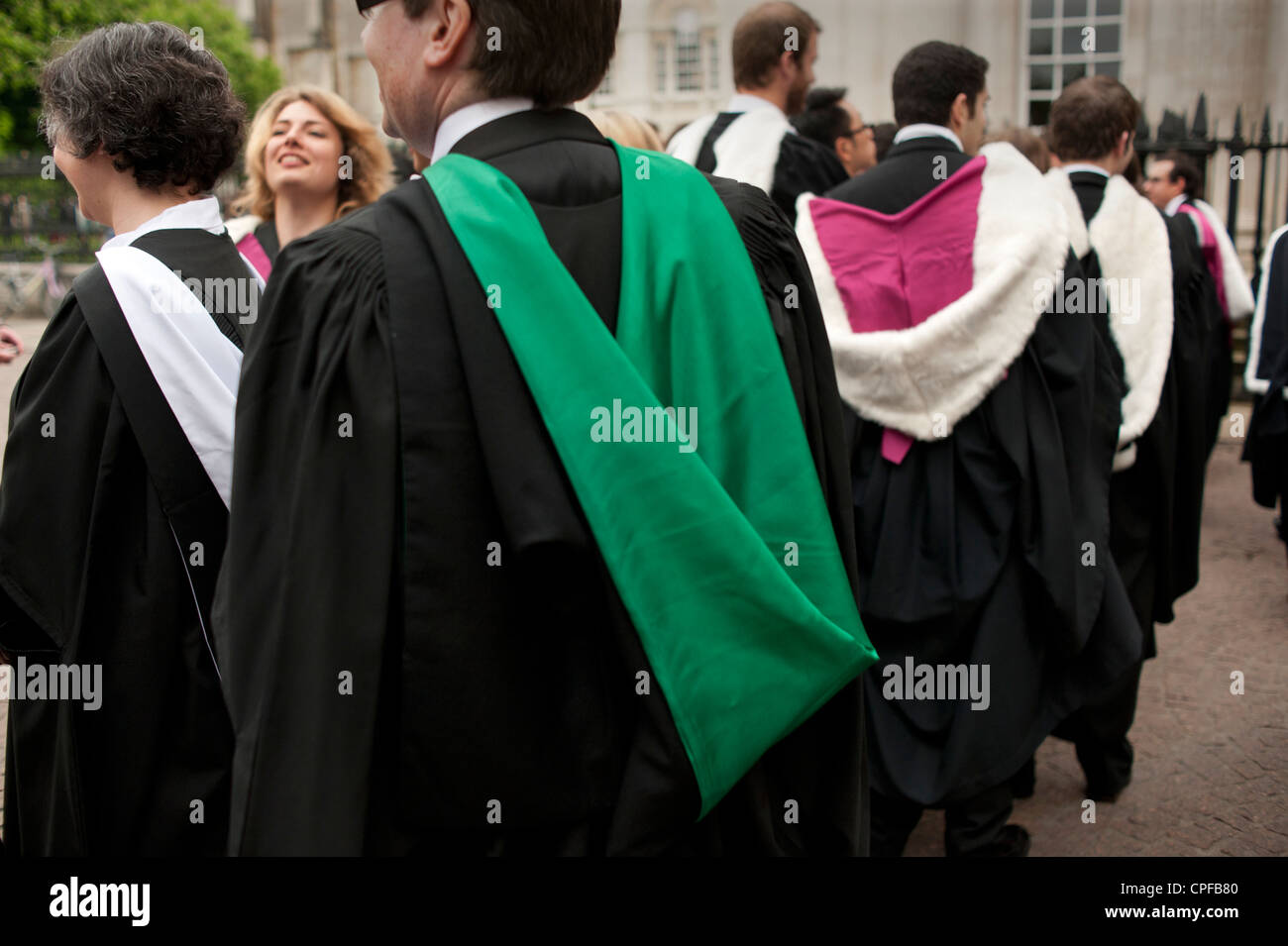 Cambridge University students queue outside the senate house waiting to ...