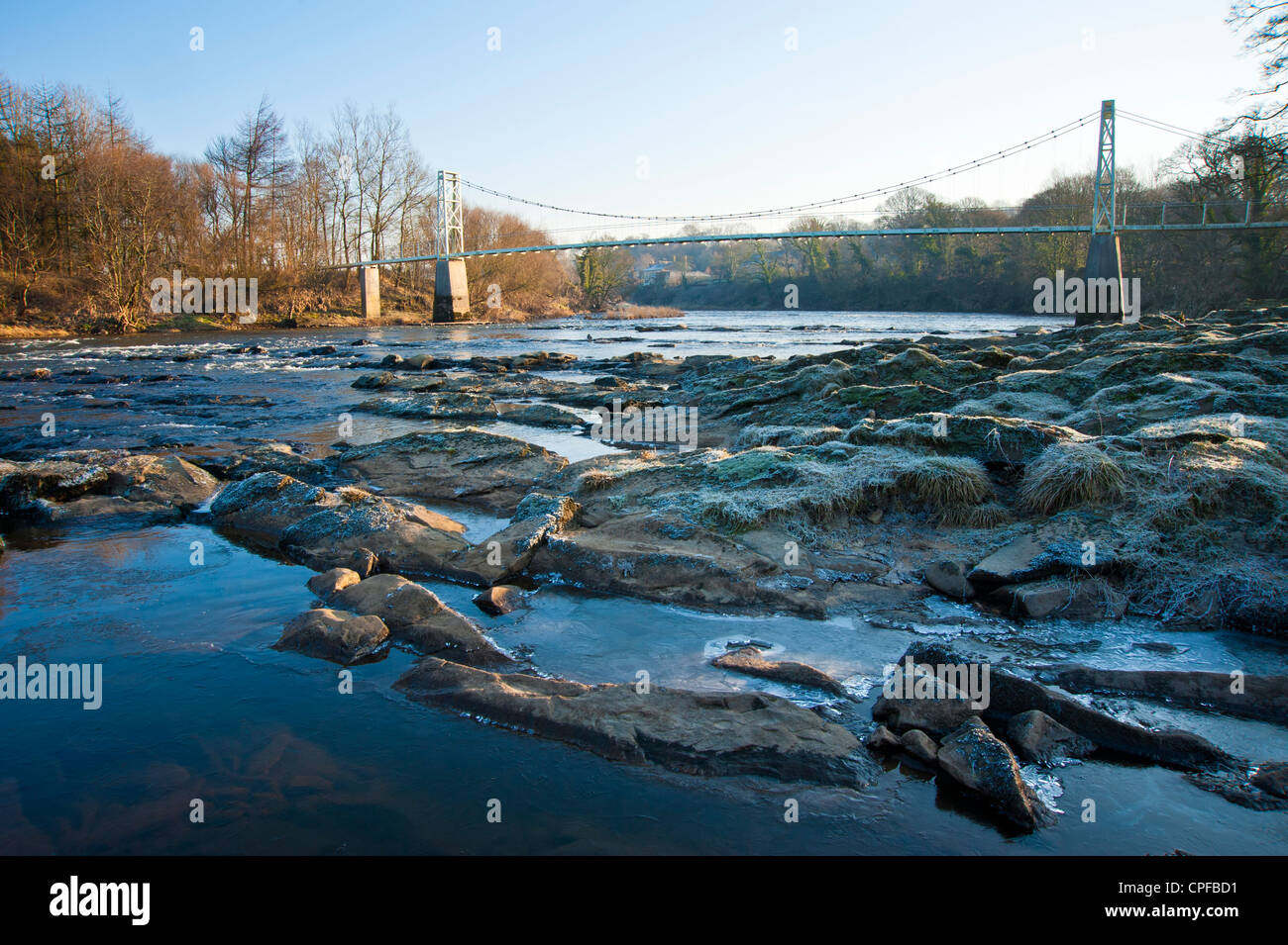 Pedestrian suspension bridge at Dinckley on the River Ribble near ...