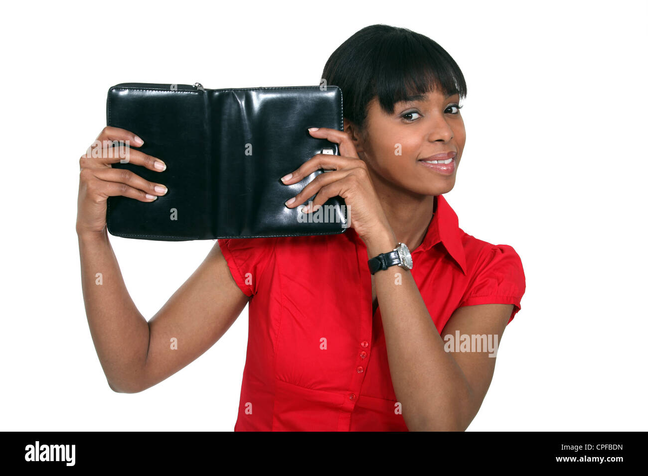 Woman with a leather personal organiser Stock Photo - Alamy