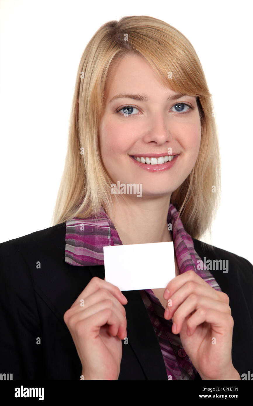 Woman showing card Stock Photo - Alamy