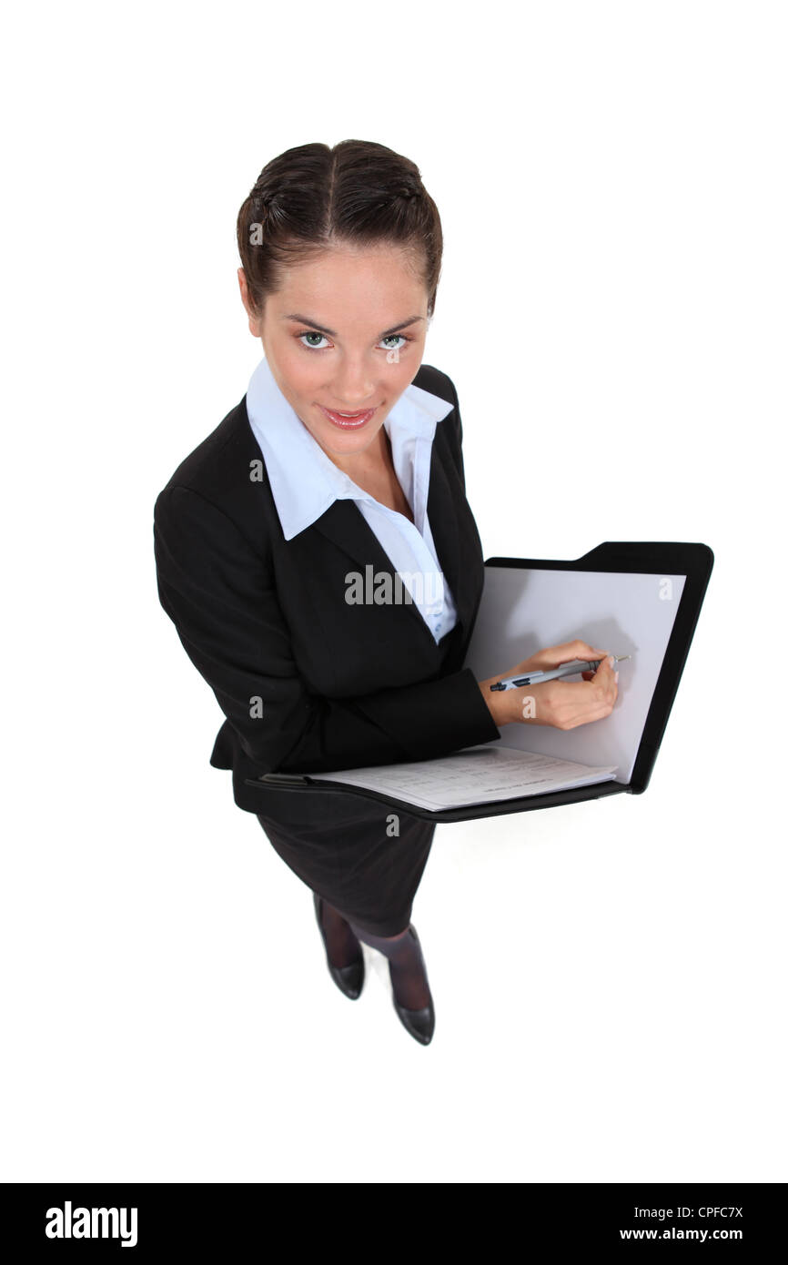 Smart woman with a notebook Stock Photo - Alamy