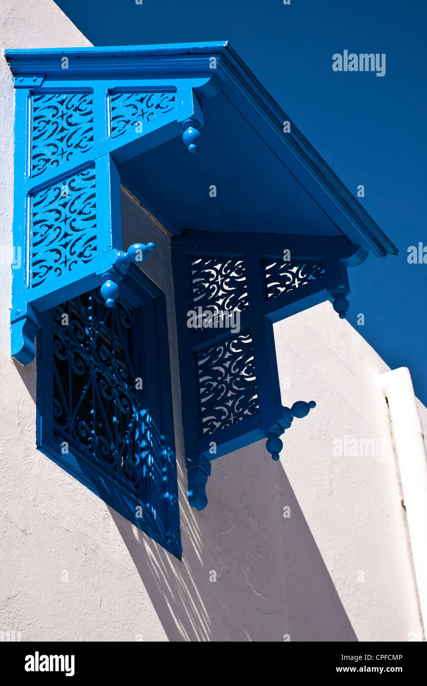 Traditional blue lattice screen or mouarabieh on a house in Sid Bou ...