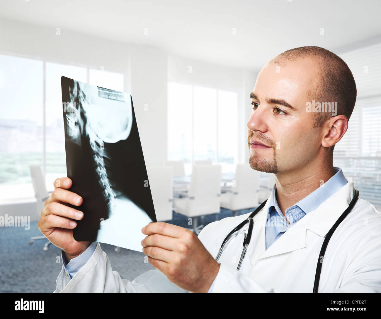 caucasian doctor look x-ray in office Stock Photo - Alamy