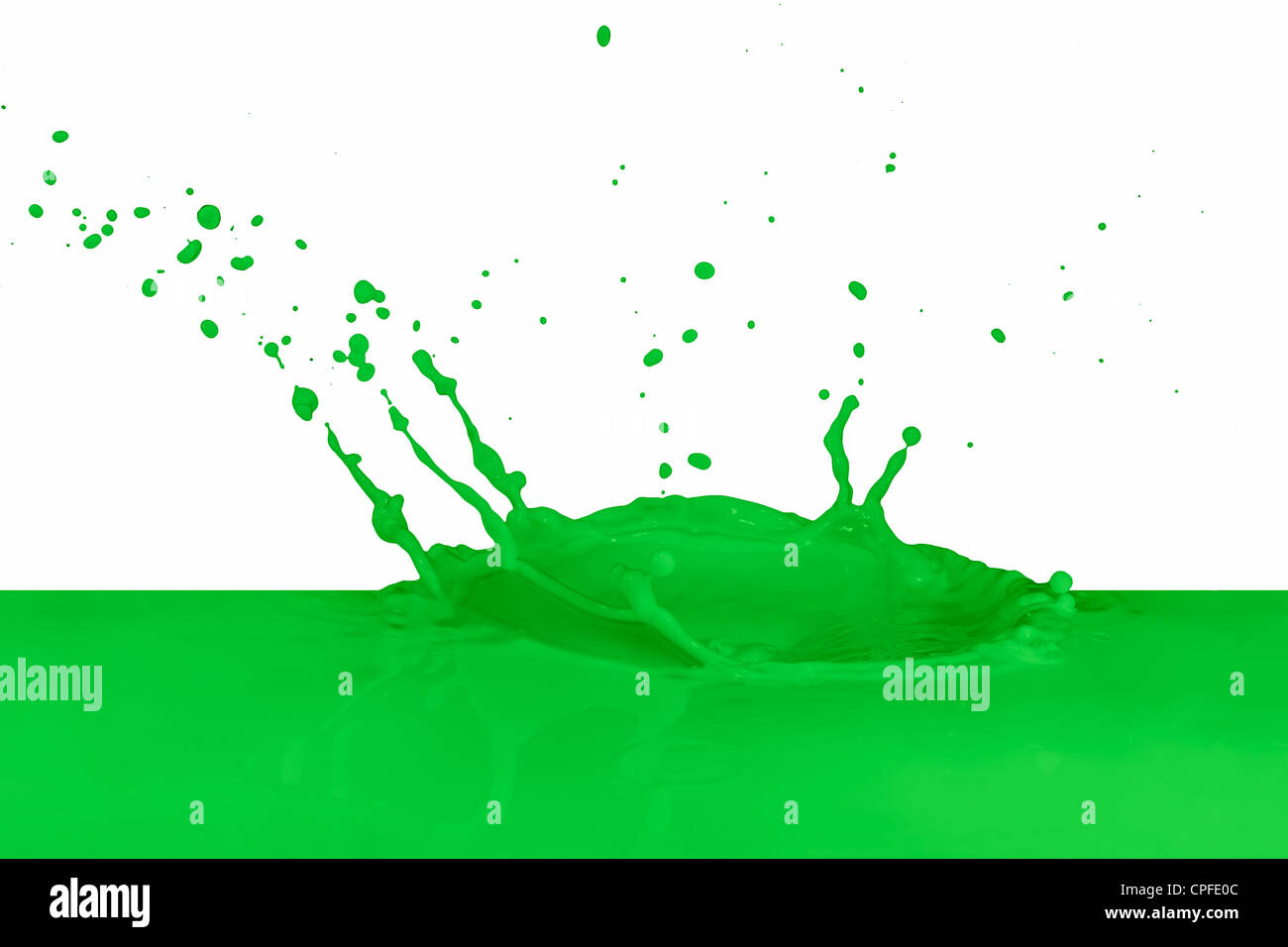 green paint splashing on white Stock Photo - Alamy