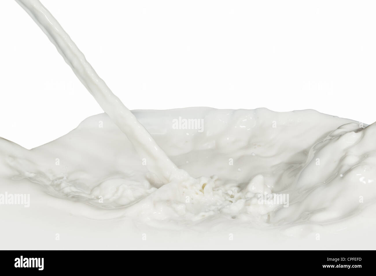 splashing milk isolated on white background Stock Photo - Alamy