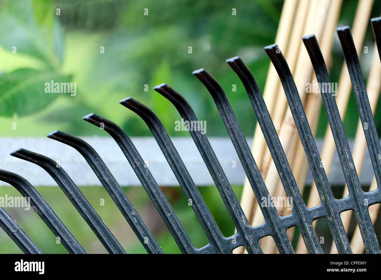 A section of a garden rake Stock Photo - Alamy