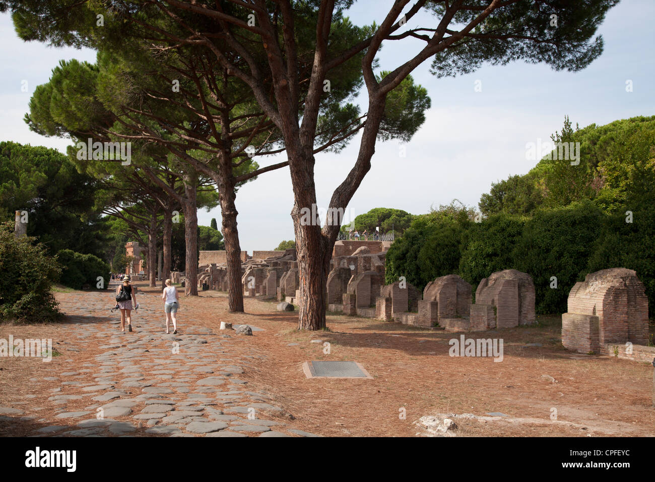 Arcades and shops on the Decumanus at The ancient roman port town ruin ...