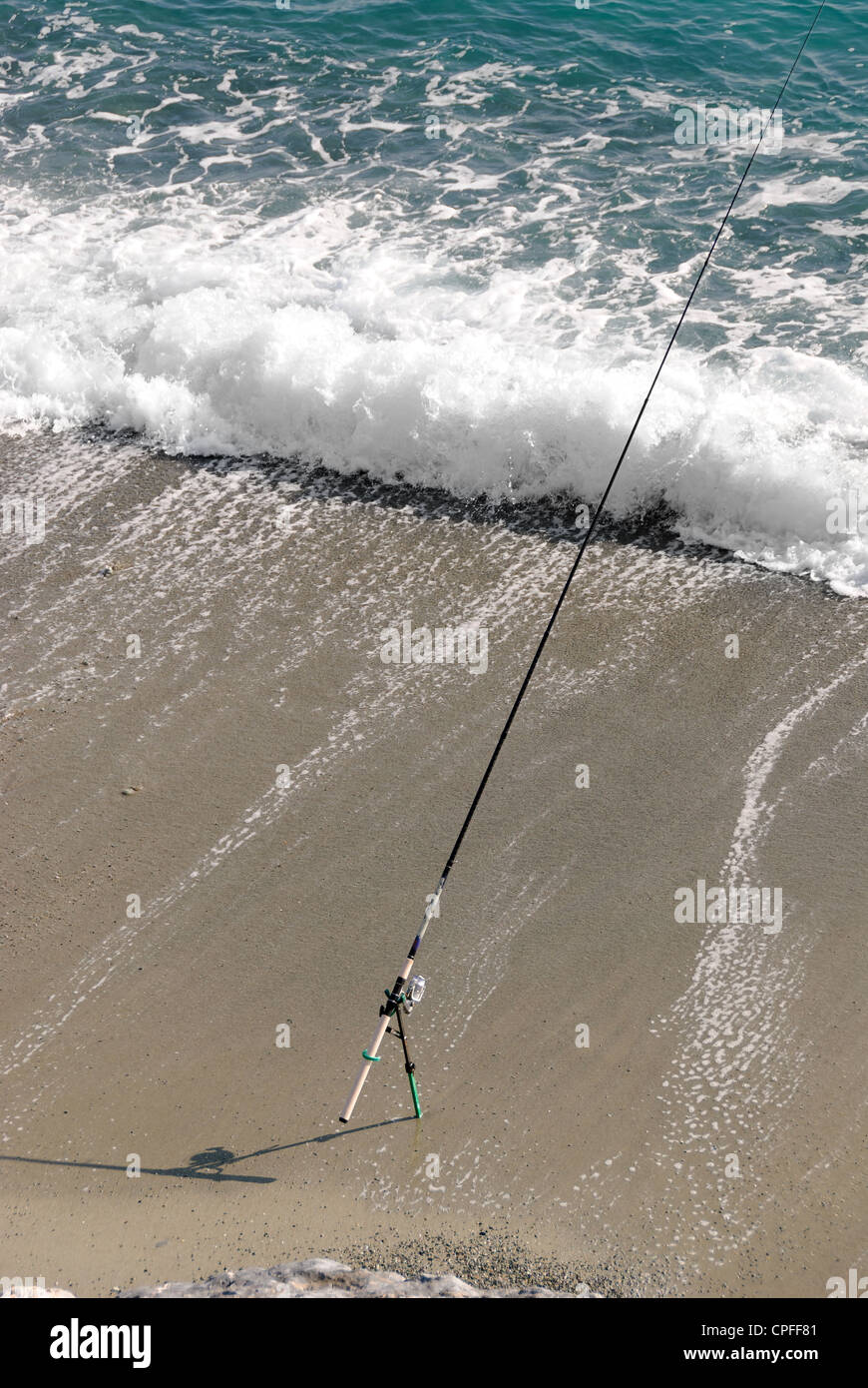 fishing rod on the beach Stock Photo - Alamy