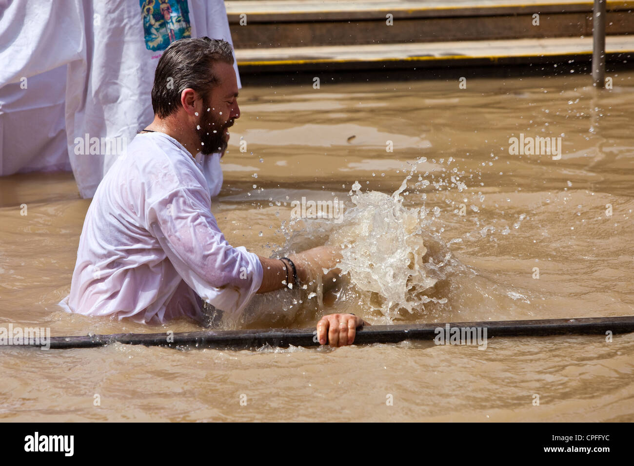 Russian Orthodox Christian Baptism, on the Israeli bank of the River ...
