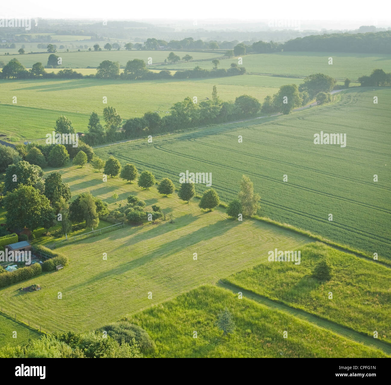 view over the early summer green fields from the air; East Anglia; UK ...