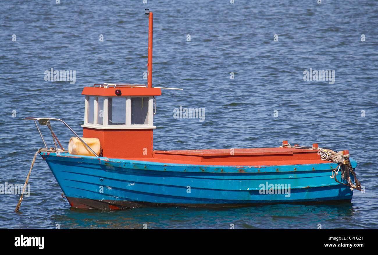 Orange and blue boat hi-res stock photography and images - Alamy
