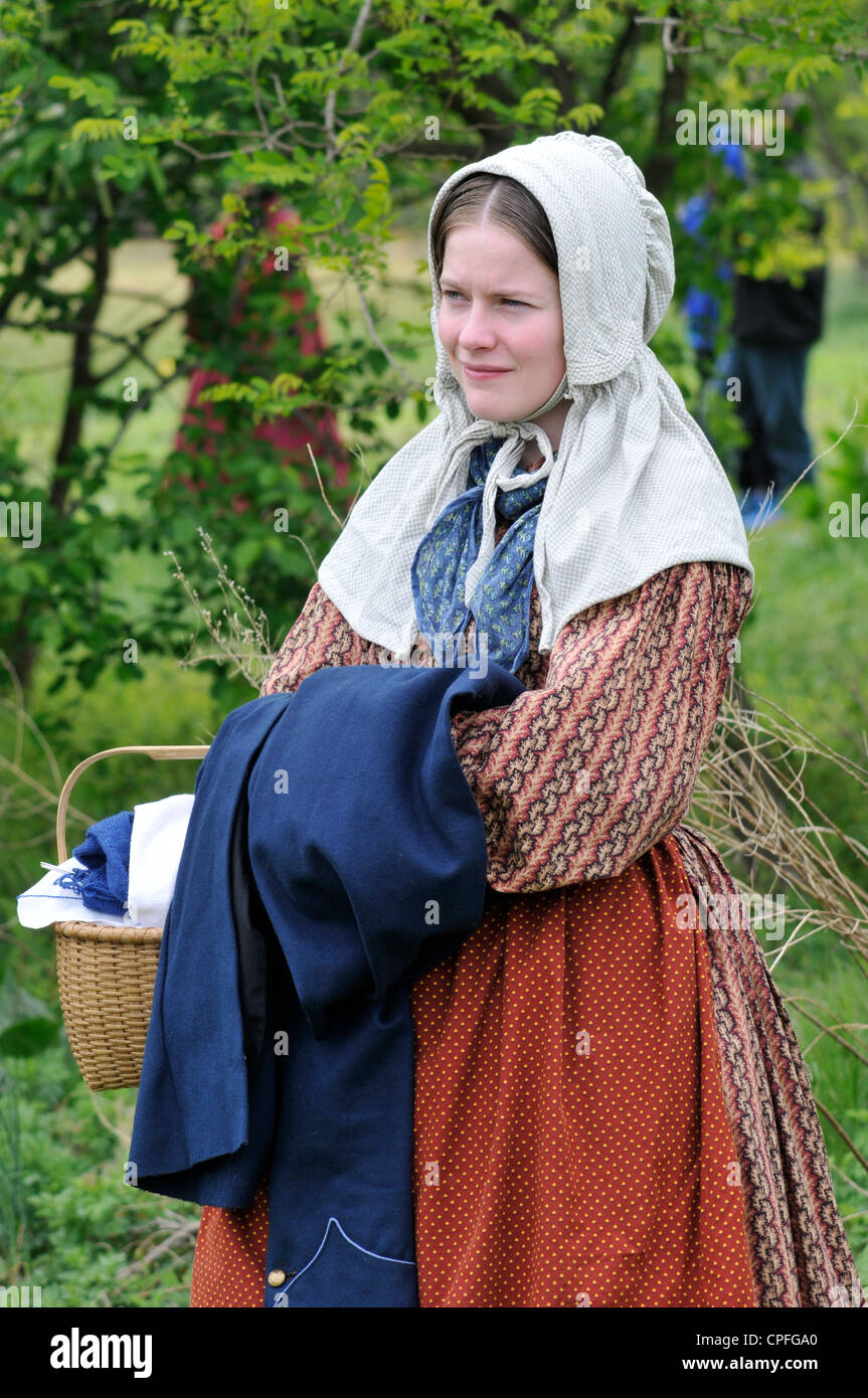 Pretty young peasant woman with basket, War reenactment , Bensalem, USA ...