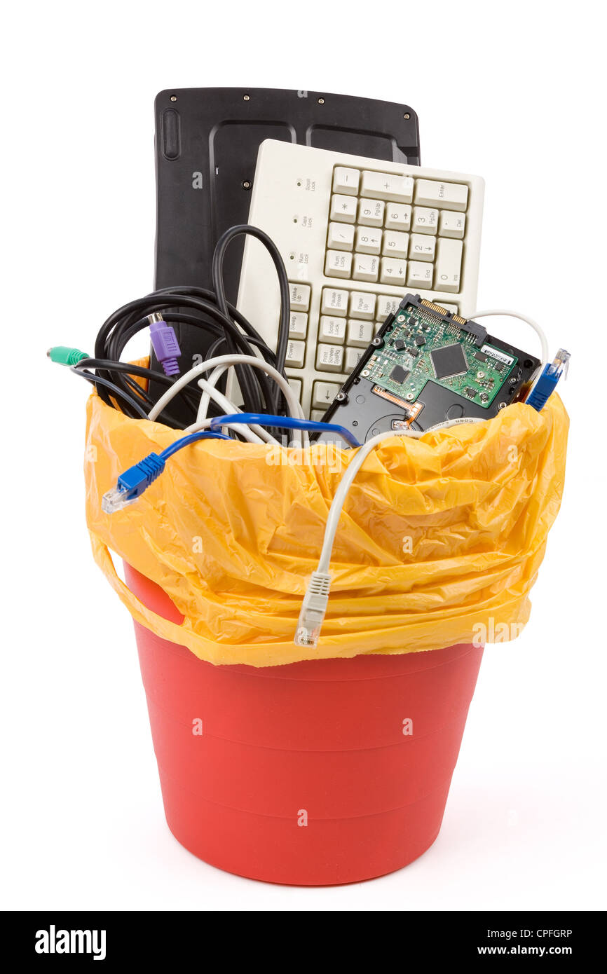 Red Garbage Can and Discarded Computer Hardware Stock Photo - Alamy
