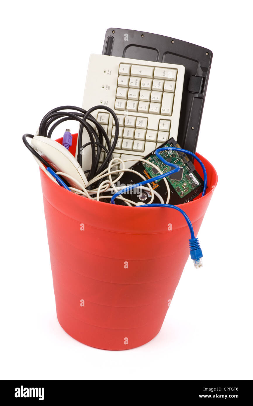 Red Garbage Can and Discarded Computer Hardware Stock Photo - Alamy