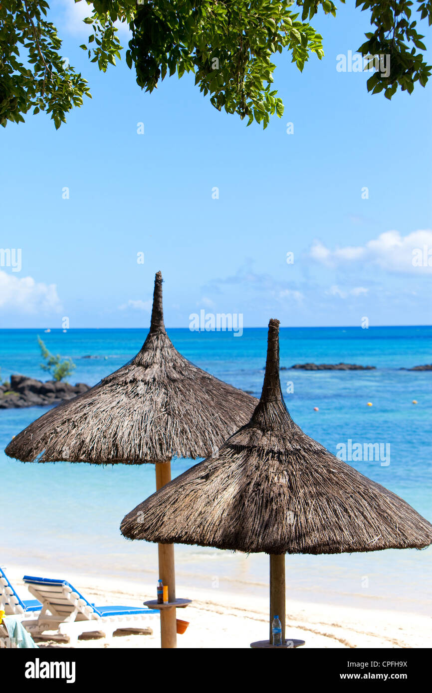 Sun-protection umbrellas, beach, sea. Mauritius Stock Photo - Alamy