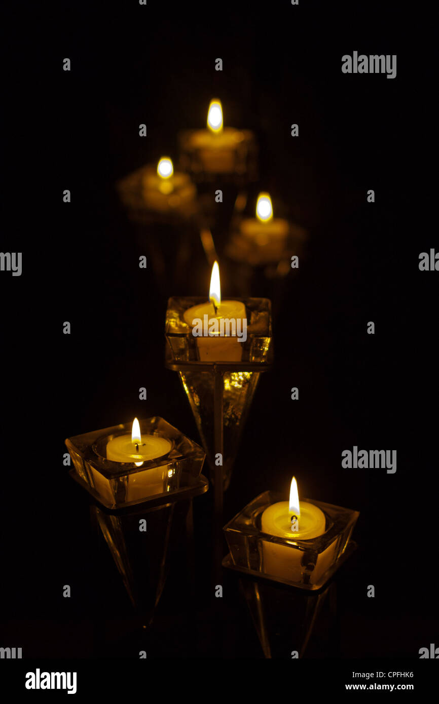 Triple candle light Stock Photo - Alamy