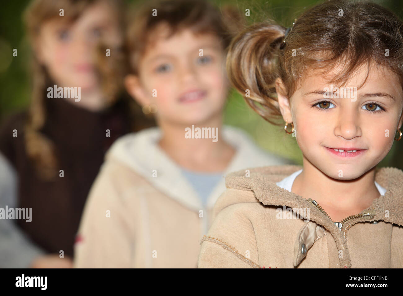 Row of girls Stock Photo - Alamy