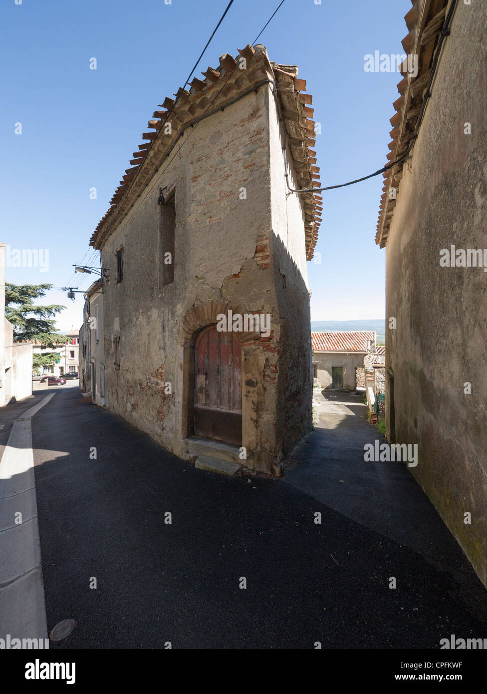 An unusual pointed corner house in the hilltop village of Montreal ...