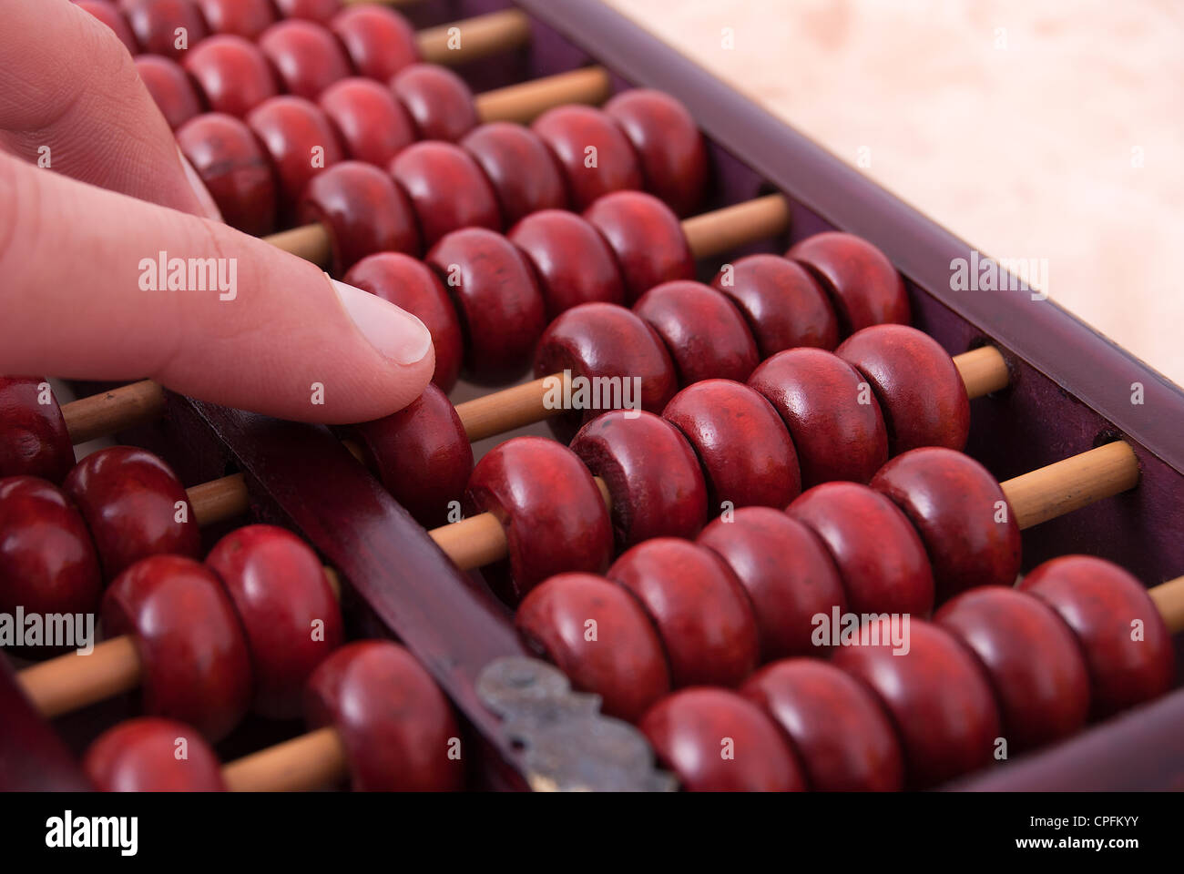 Counting using an abacus Stock Photo - Alamy