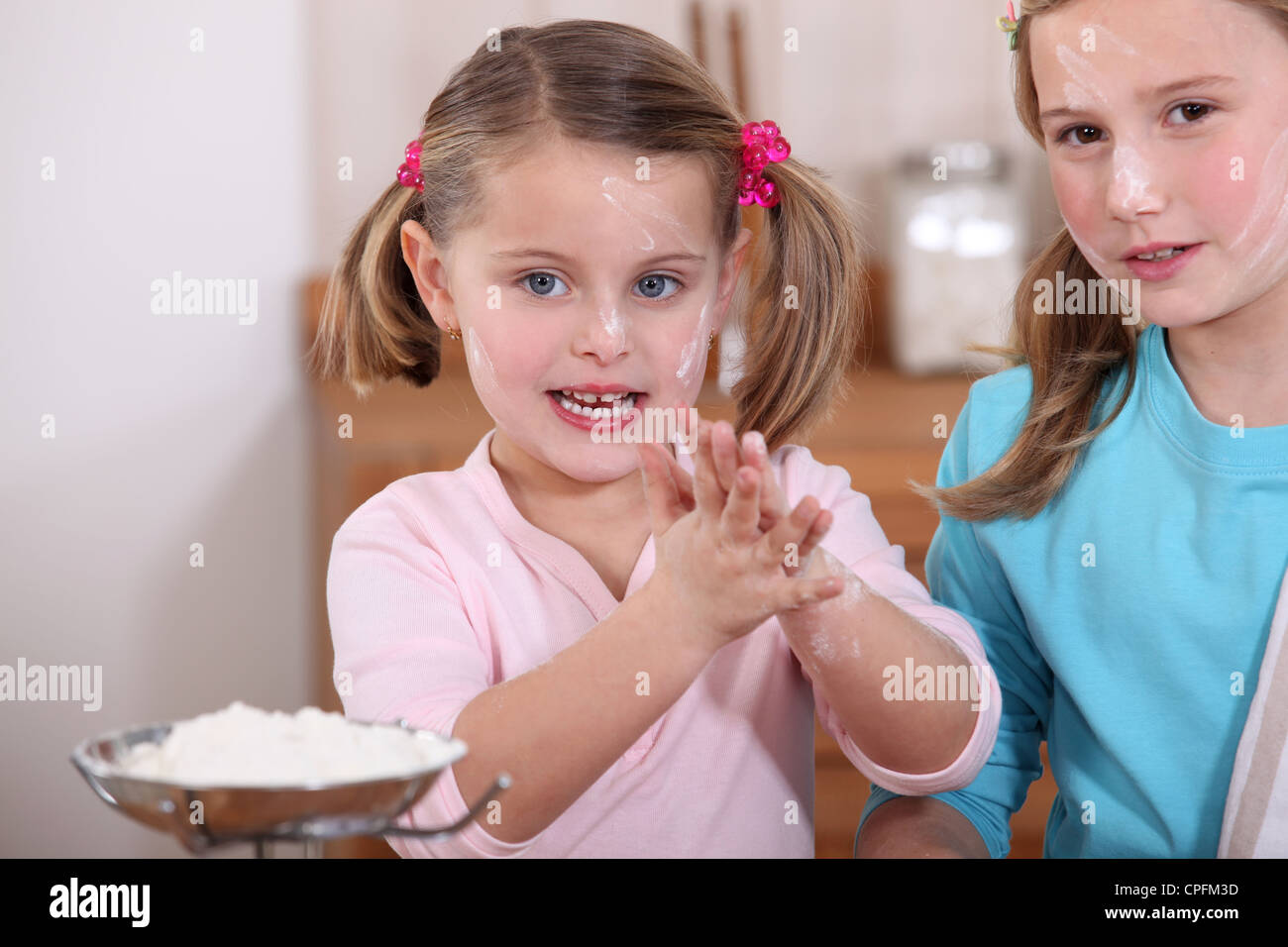 Children baking in the kitchen Stock Photo - Alamy