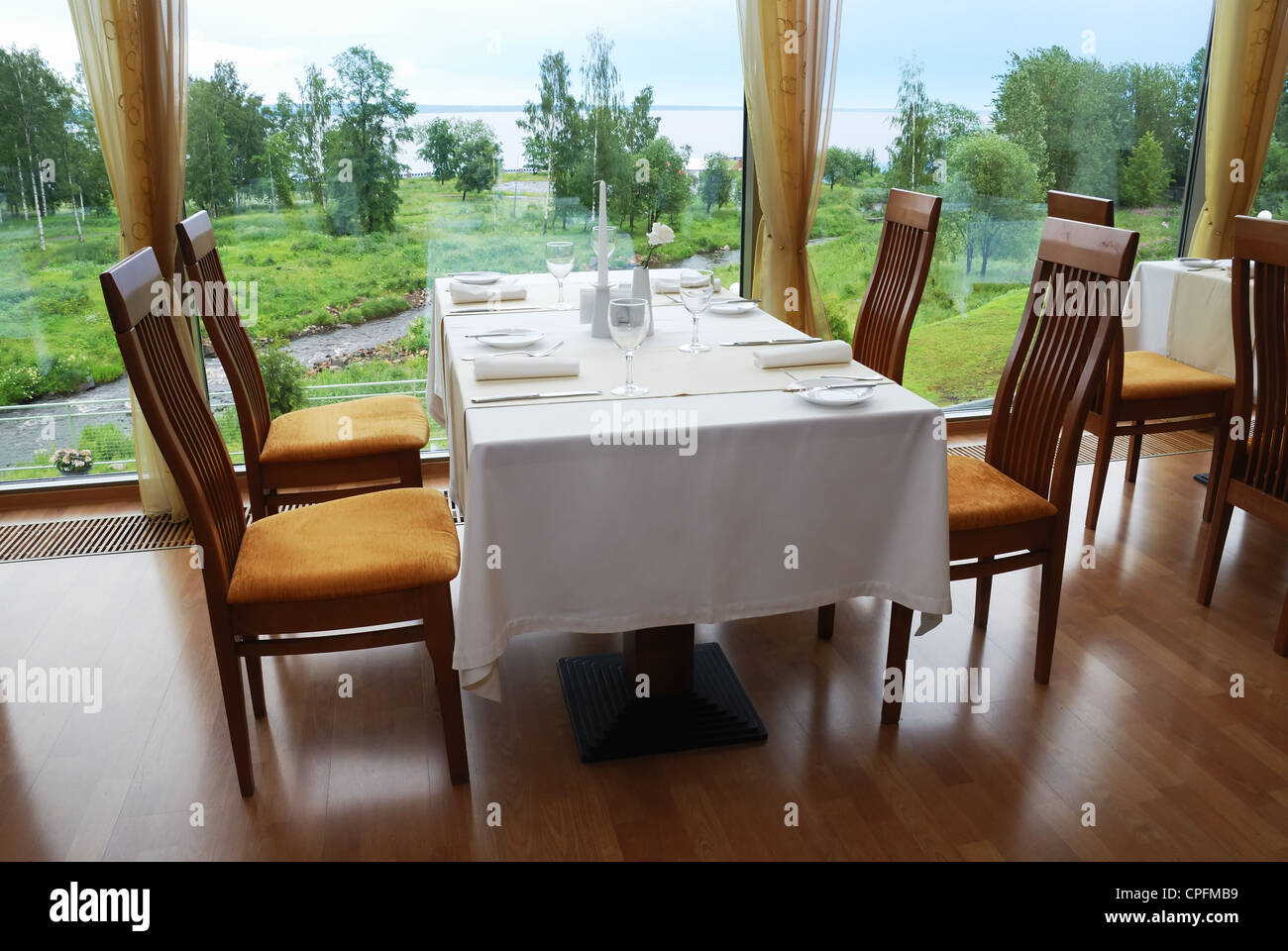 table appointments in restaurant against window horizontal Stock Photo ...