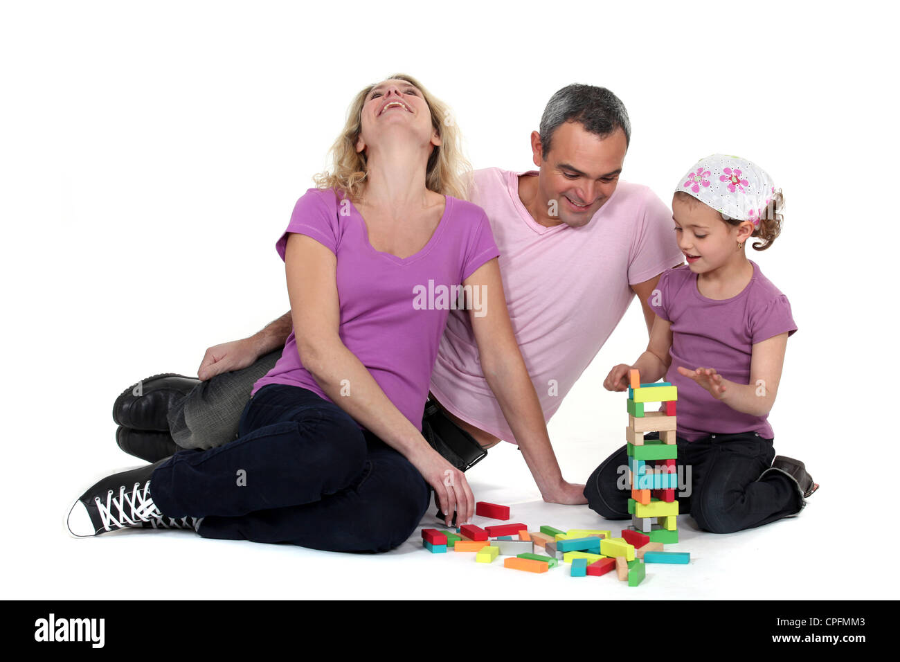 Family playing with building blocks Stock Photo - Alamy