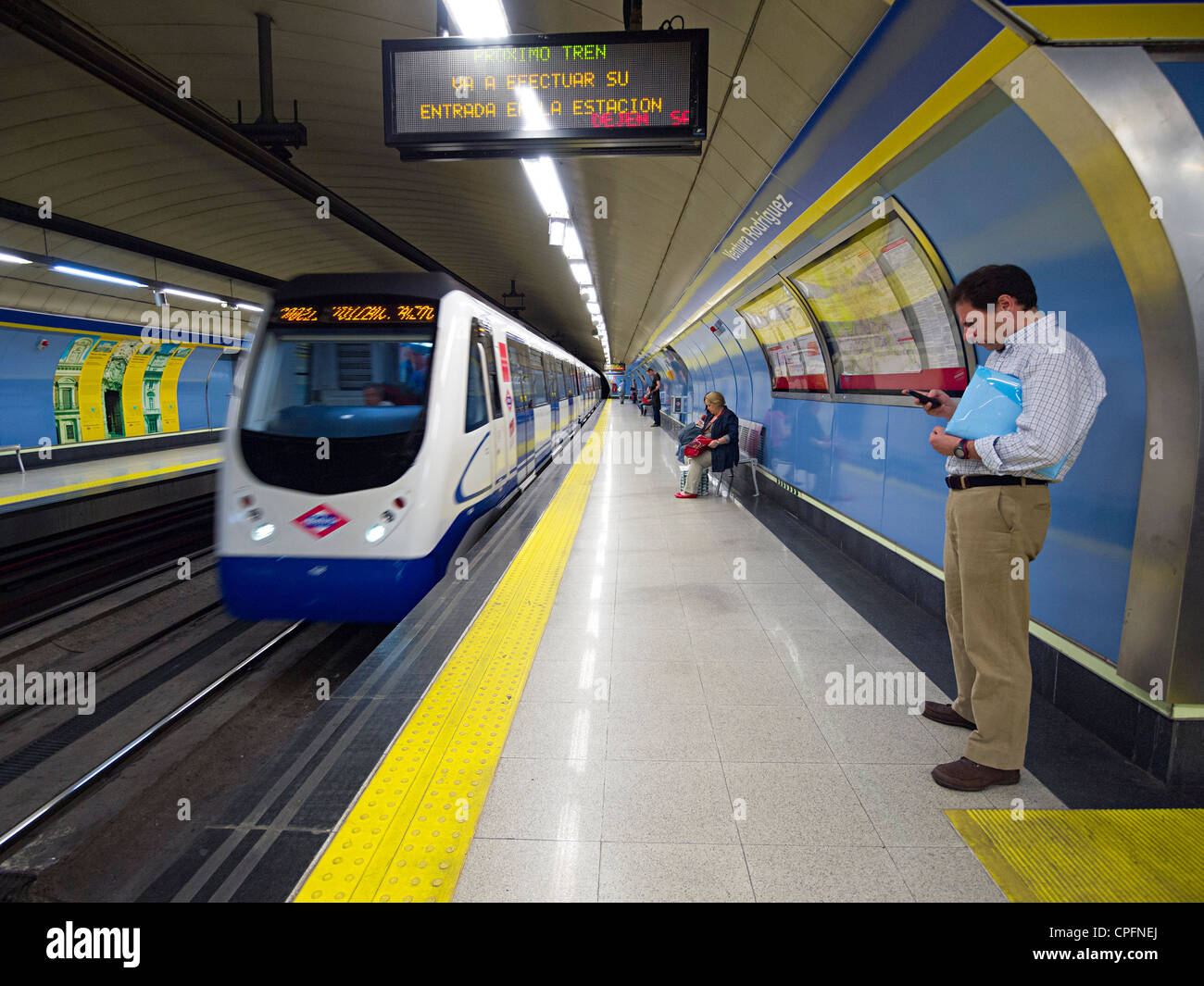 Train arriving at underground metro station platform in Madrid, Spain ...