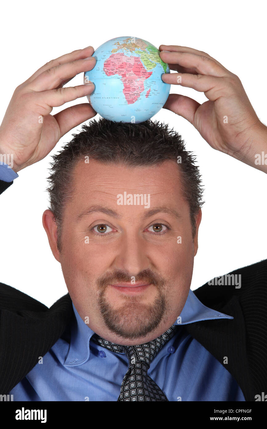 Man earth globe in head hi-res stock photography and images - Alamy