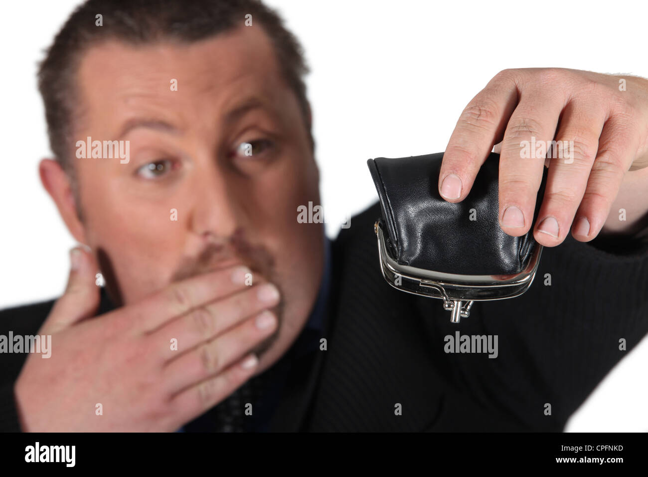 Man holding empty purse Stock Photo - Alamy