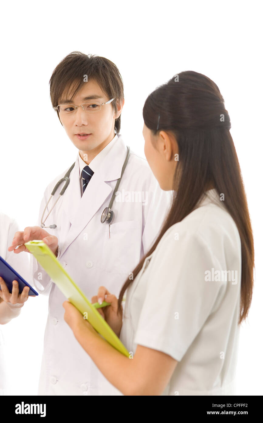 Doctor and female doctor talking Stock Photo - Alamy