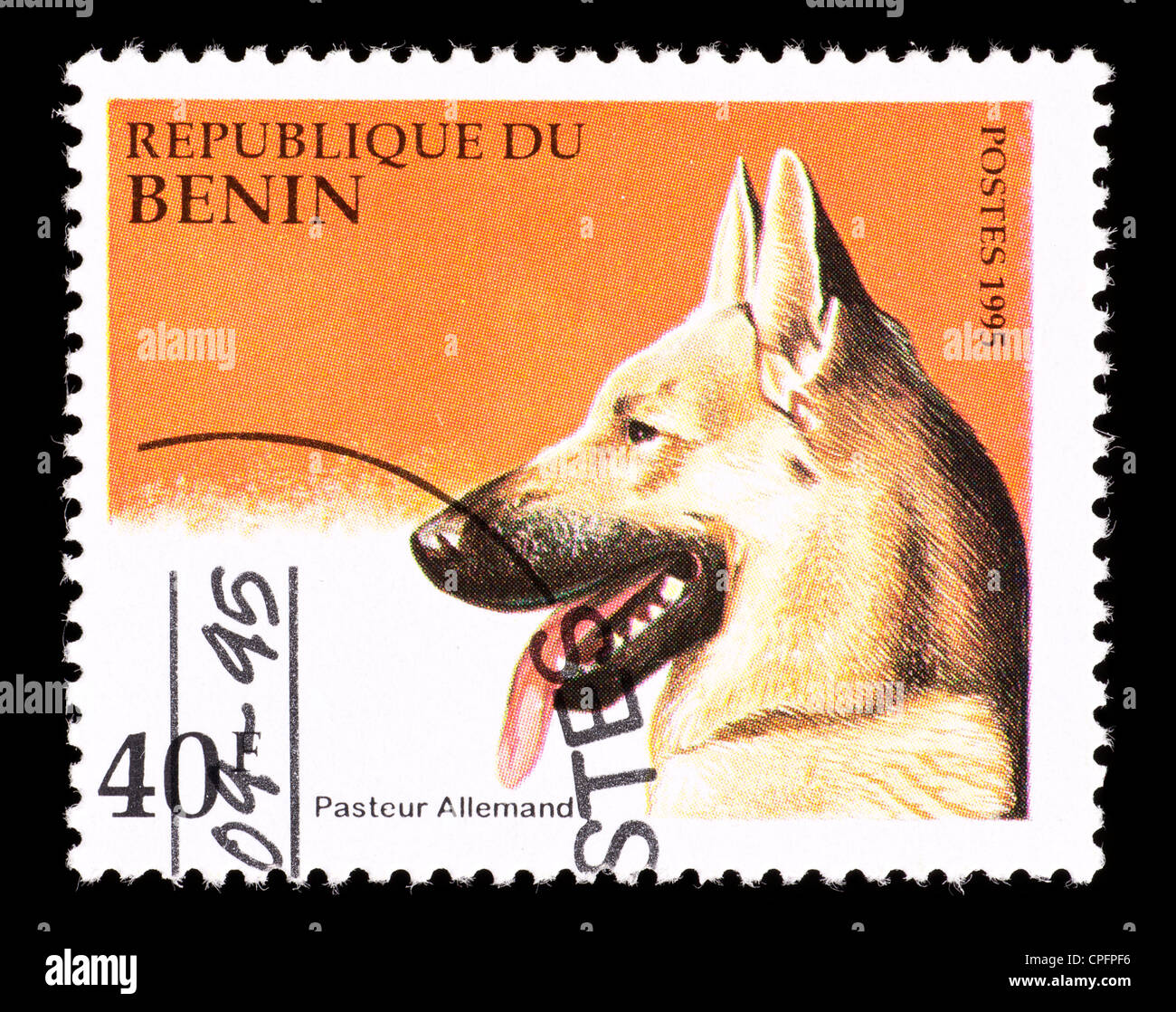 Postage stamp from Benin depicting a German shepherd dog Stock Photo ...