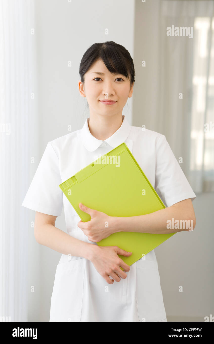 Portrait of female nurse Stock Photo - Alamy