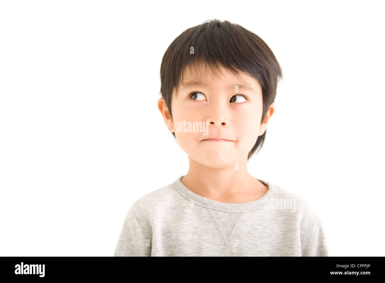 Boy looking with a sidelong glance Stock Photo - Alamy