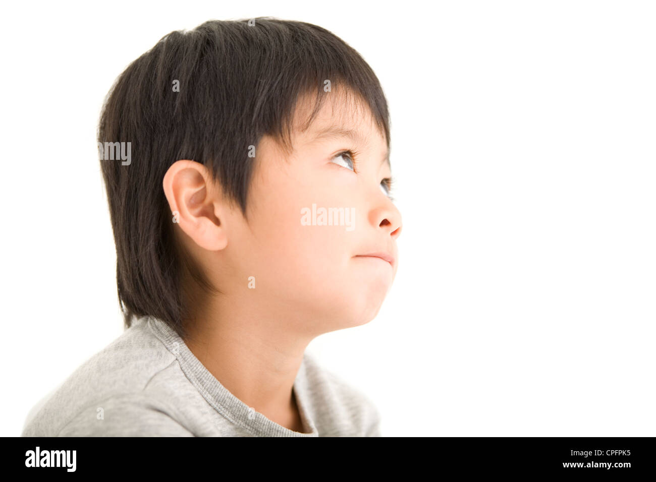Boy looking up Stock Photo - Alamy