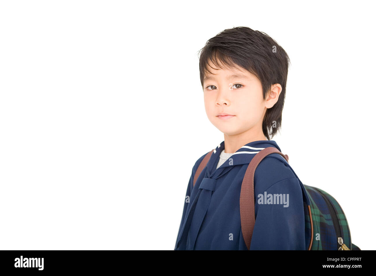 Boy carrying school satchel on back Stock Photo - Alamy