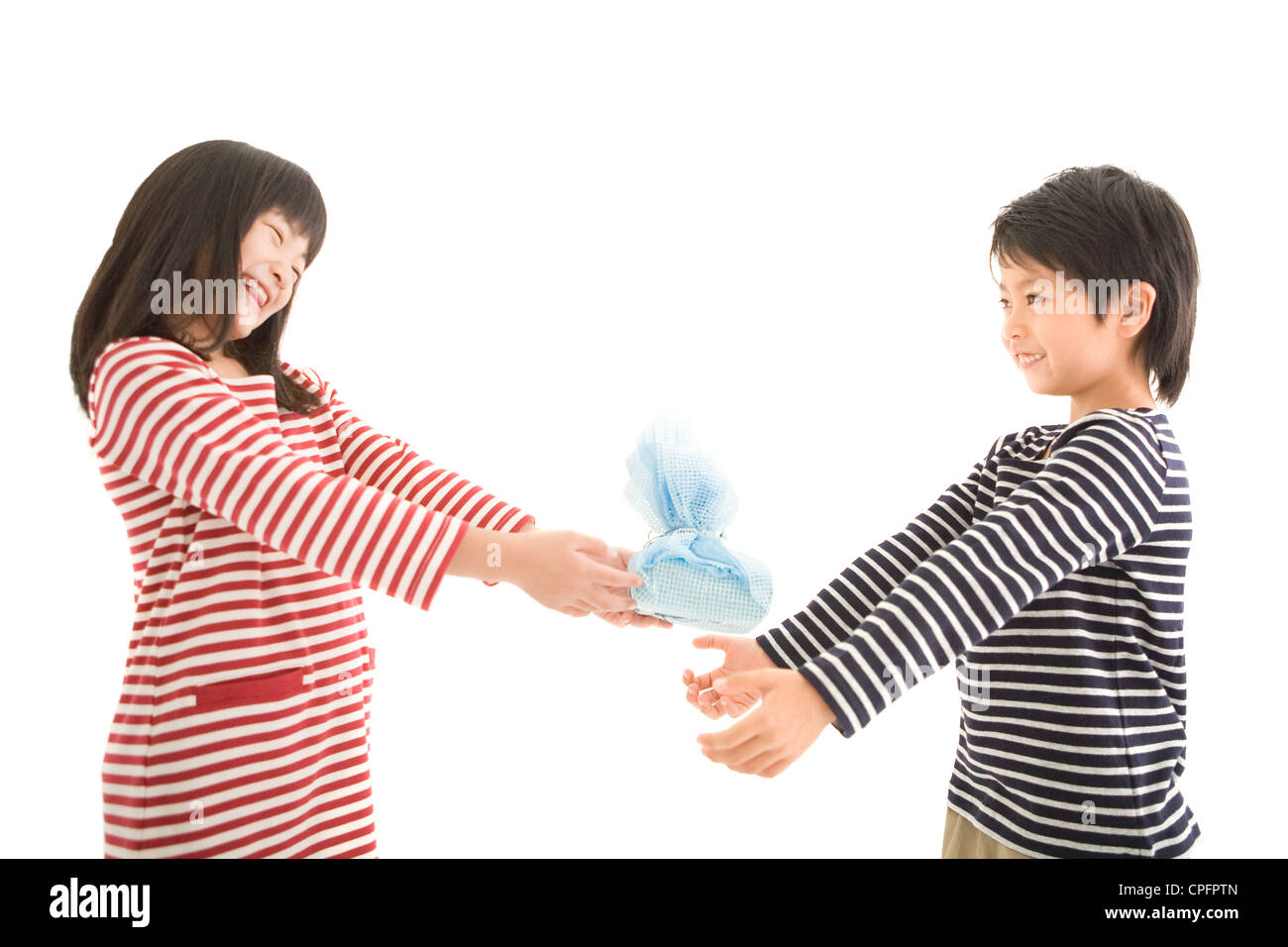 Girl holding kid boy Cut Out Stock Images & Pictures - Alamy