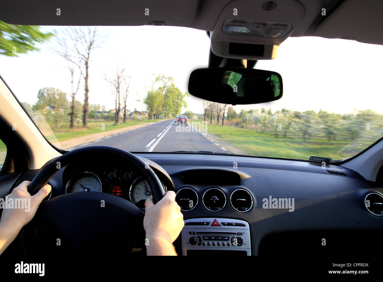 Fast ride in car on the street Stock Photo - Alamy