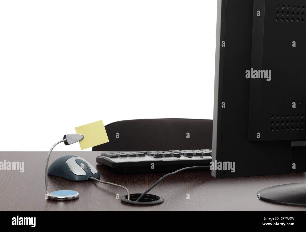 Image of an empty office desk with a blank yellow post-it Stock Photo ...