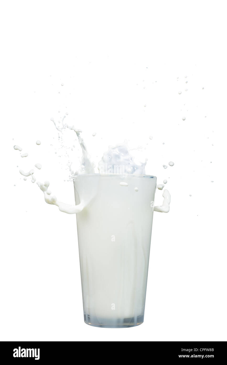 Pouring glass milk from glass Cut Out Stock Images & Pictures - Alamy