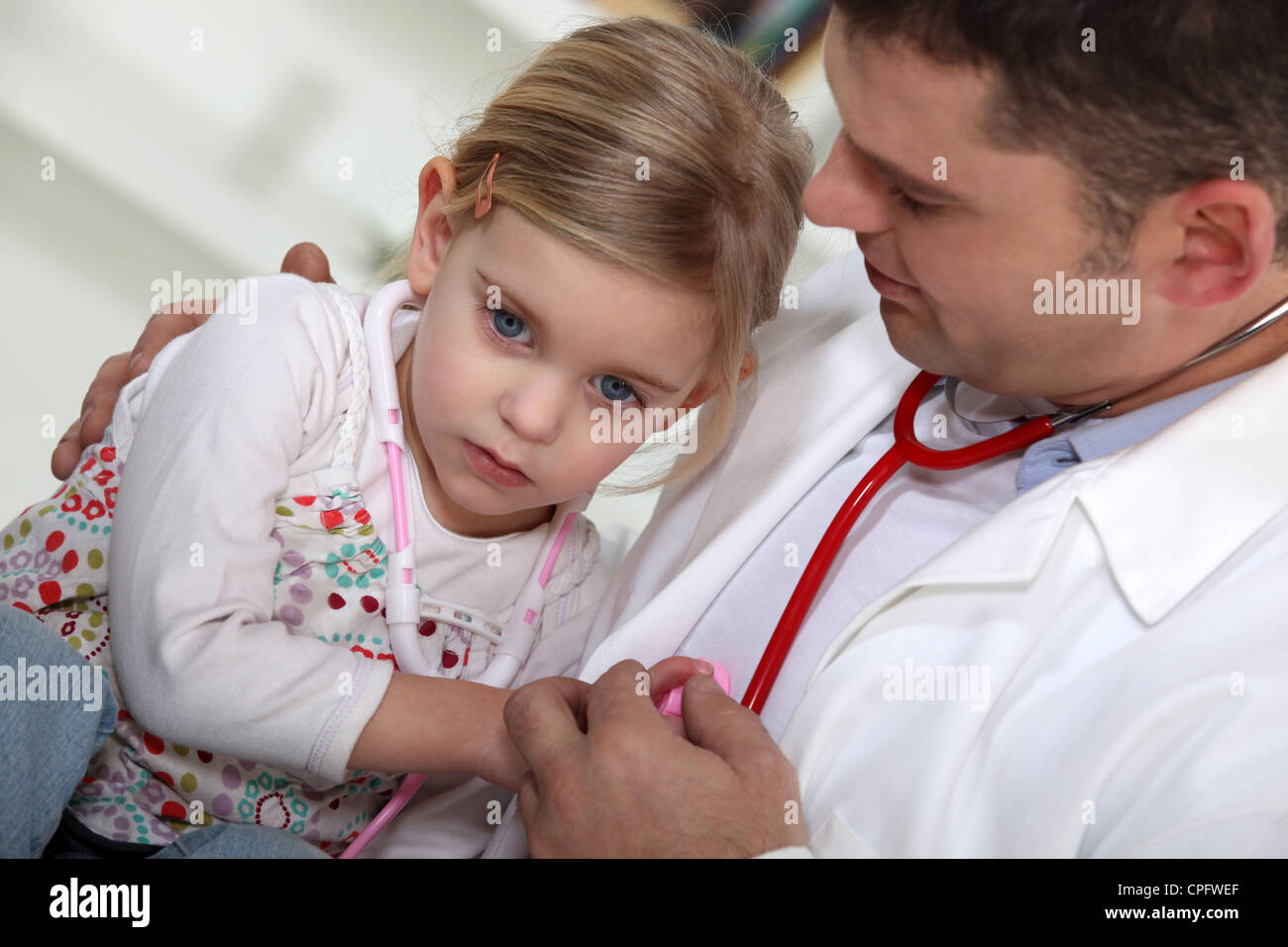 Little getting having check-up Stock Photo - Alamy