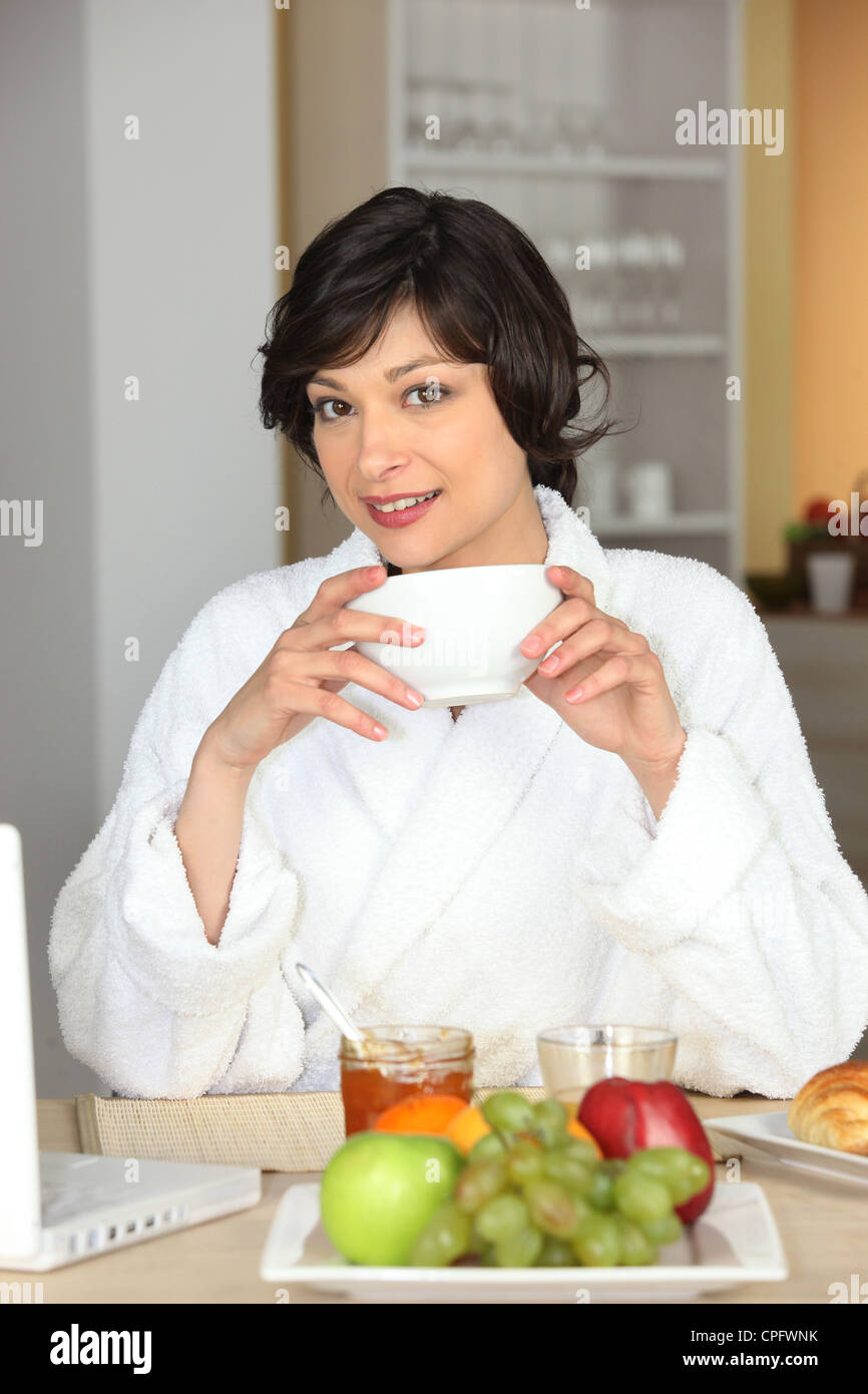 a woman having breakfast Stock Photo - Alamy